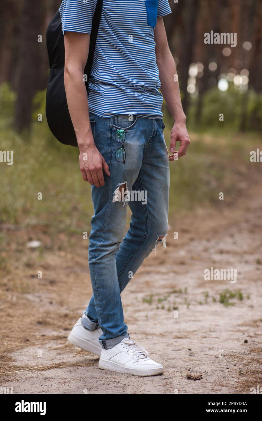 Hiking fashion man look nature outfit concept Stock Photo - Alamy