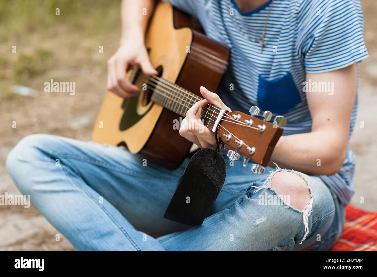 Music lifestyle man playing guitar nature concept Stock Photo - Alamy