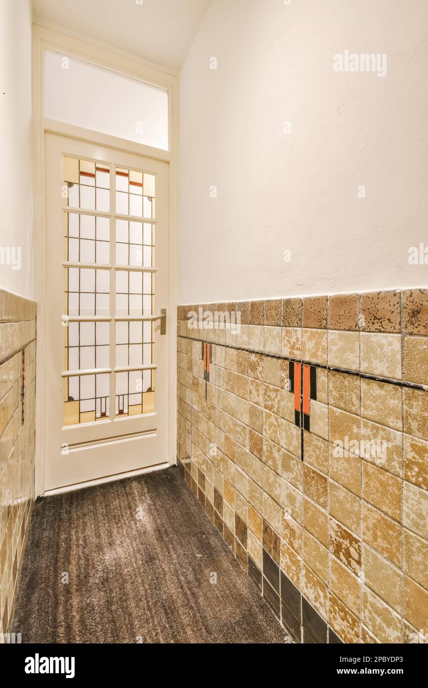 Interior design of light corridor with white walls and door with partly ...