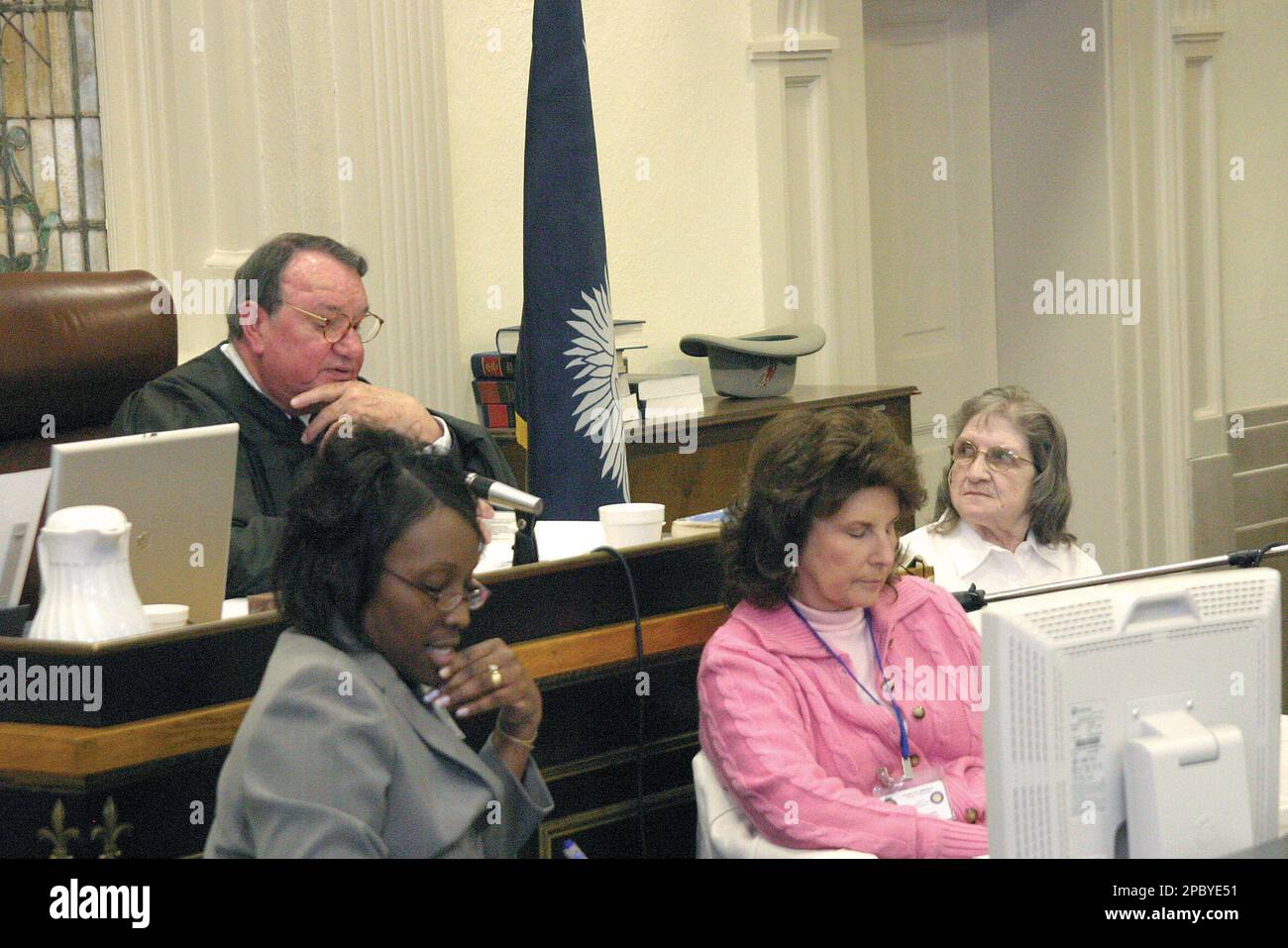 Rita Bixby, right, listens to Judge Alexander Macaulay during the ...