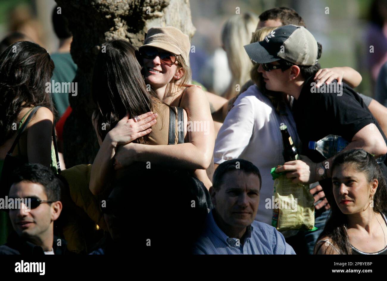 Friends and supporters of the family of James Kim are shown at a ...