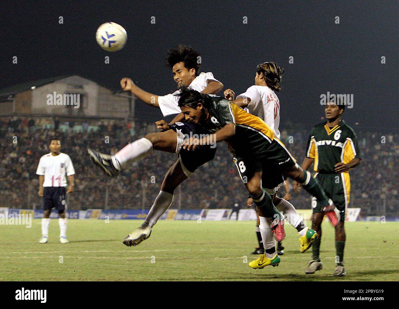 James Singh of Tamil nadu, in yellow black jersey, soccer teams heads ...