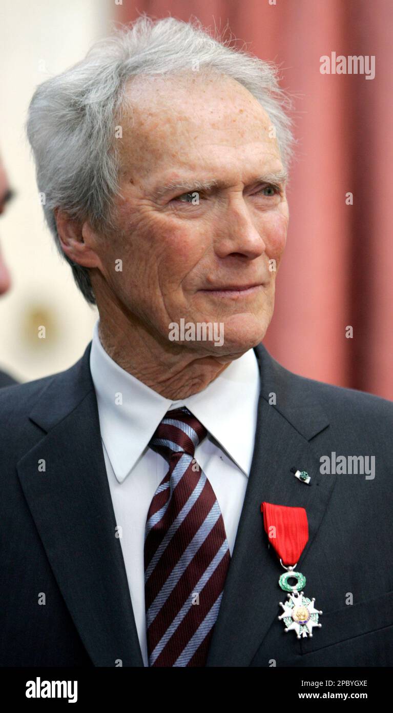 Veteran U.S. actor and director Clint Eastwood poses with his medal ...