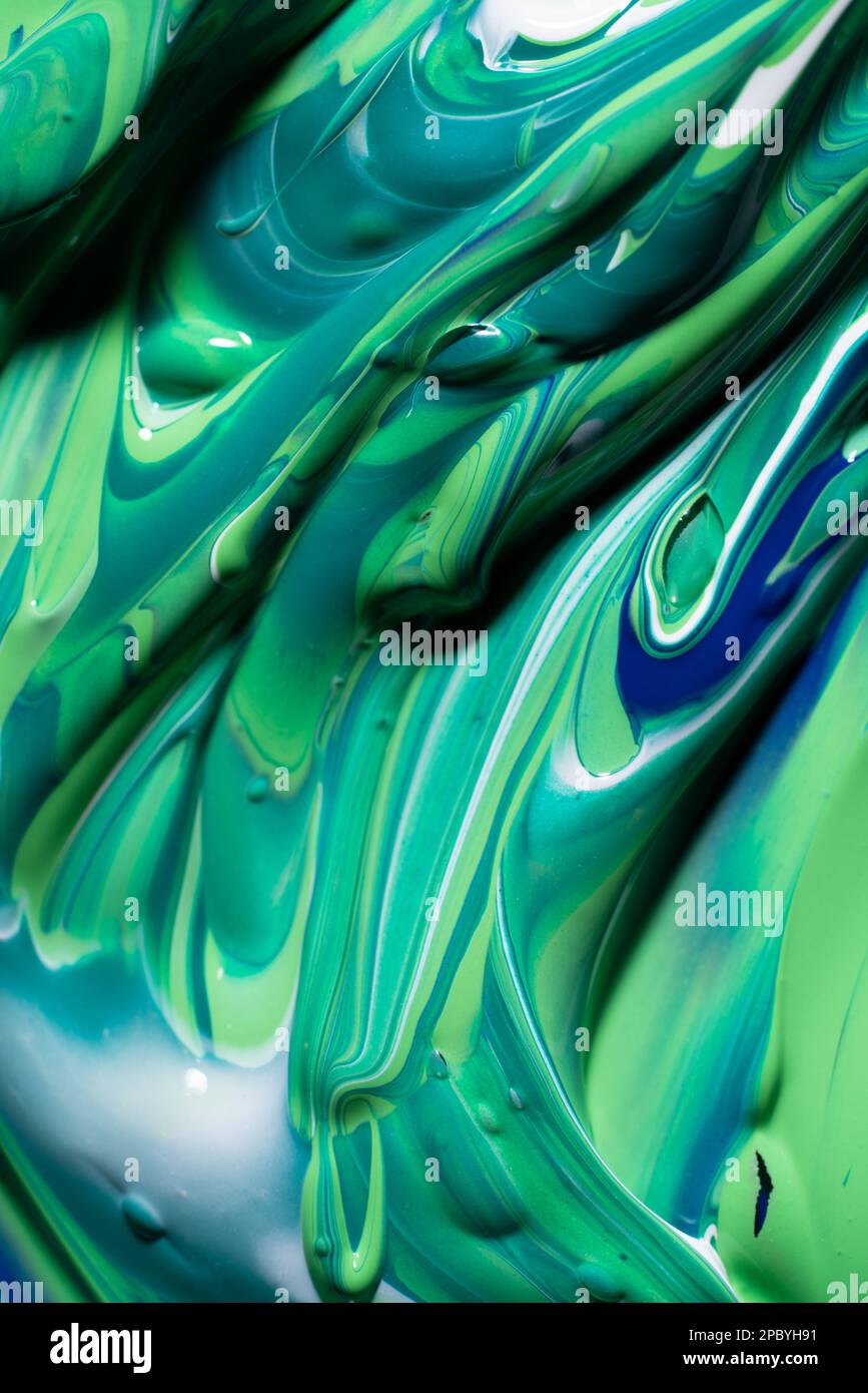 Mix of green and blue paint Stock Photo - Alamy