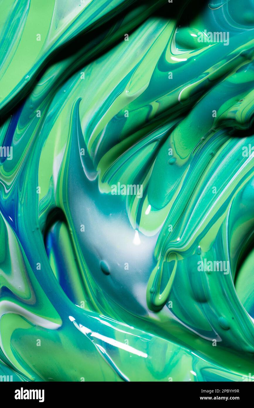 Mix of green and blue paint Stock Photo - Alamy