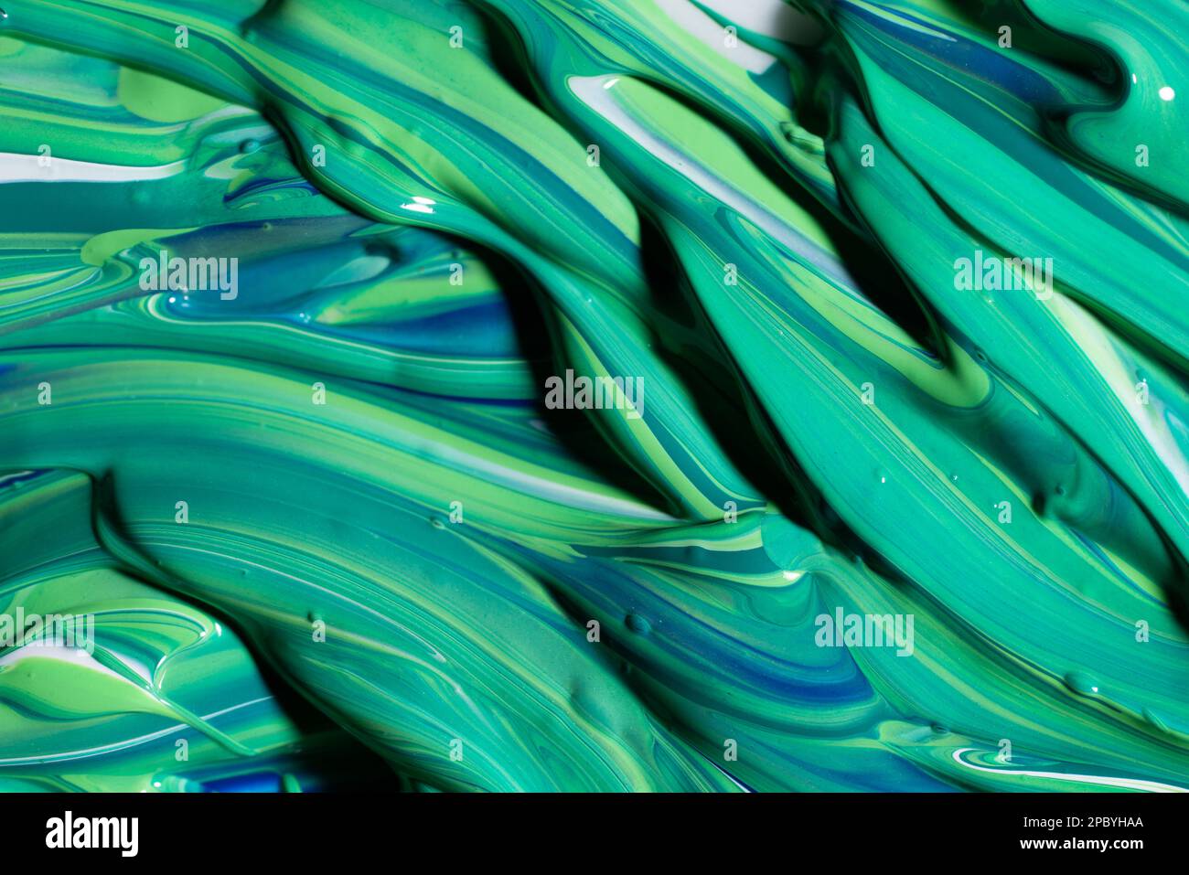 Mix of green and blue paint Stock Photo - Alamy