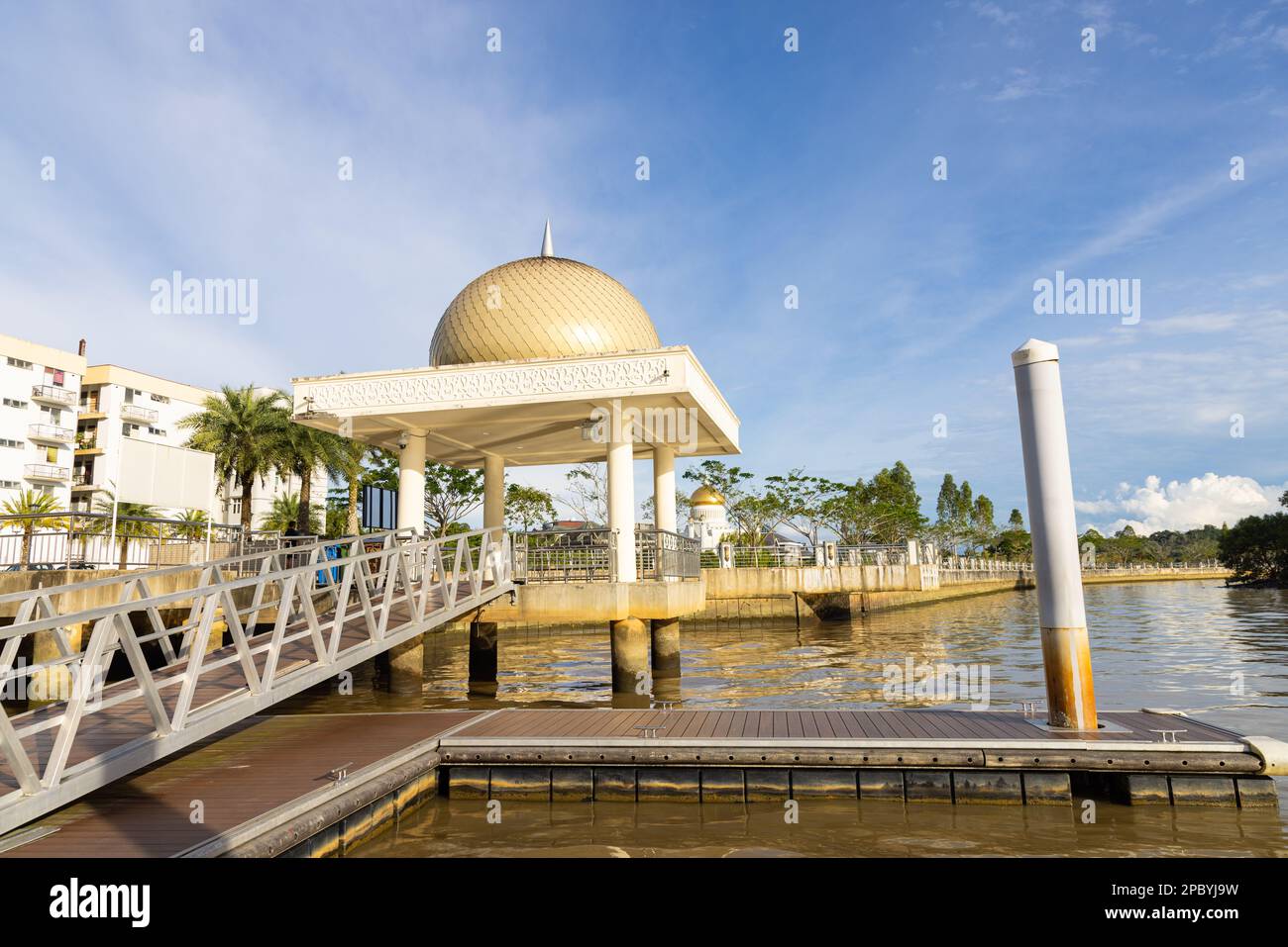 8 3 2023 trees, boat and building along Sungai Kedayan river, the ...