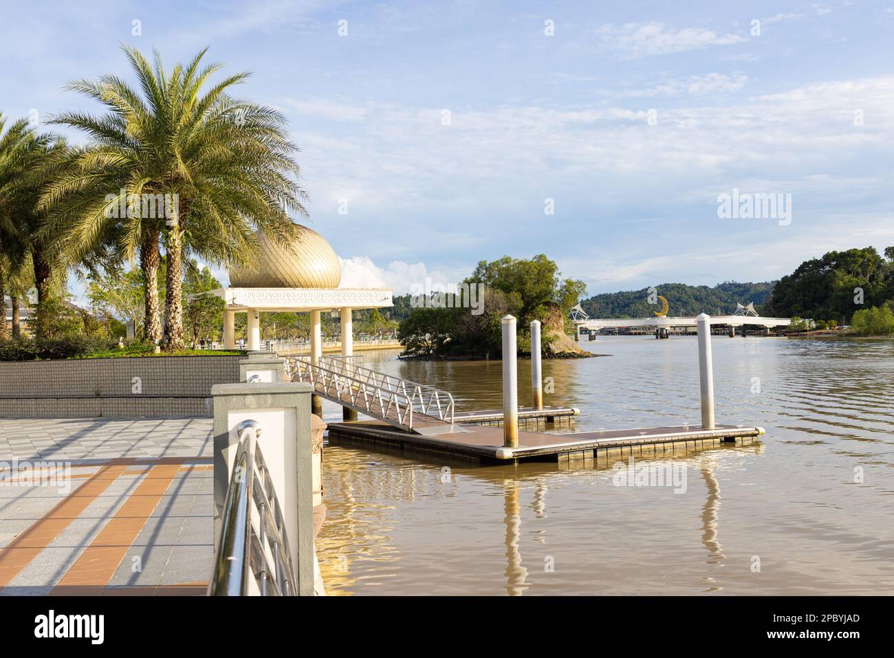 8 3 2023 trees, boat and building along Sungai Kedayan river, the ...