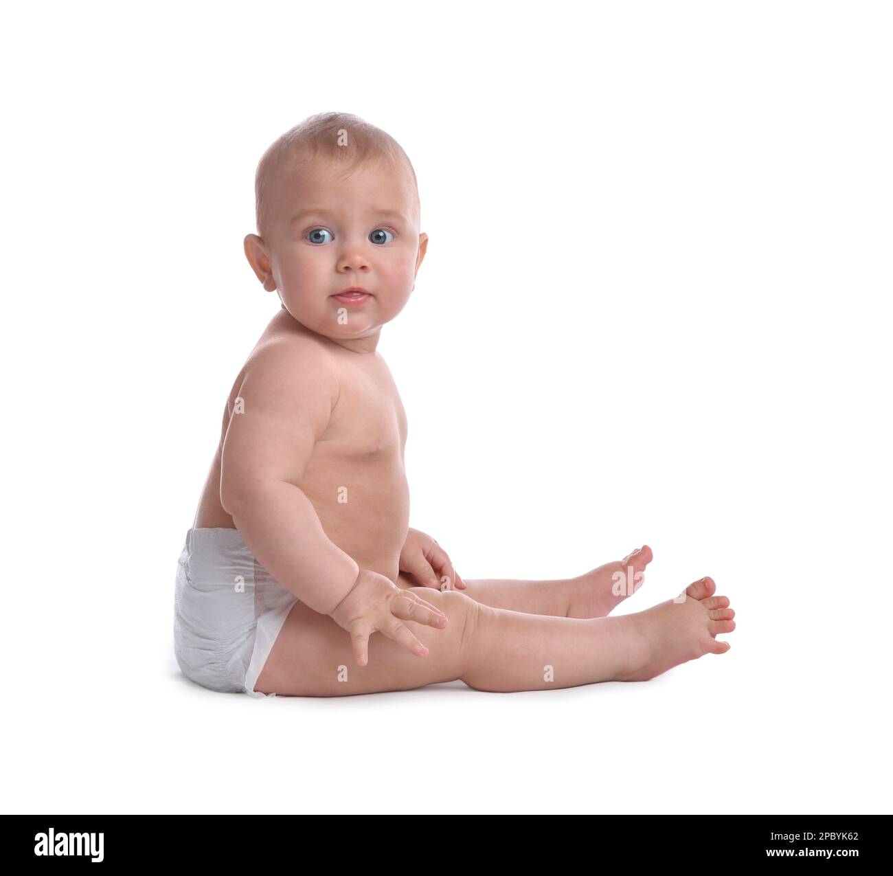 Cute baby in dry soft diaper sitting on white background Stock Photo ...