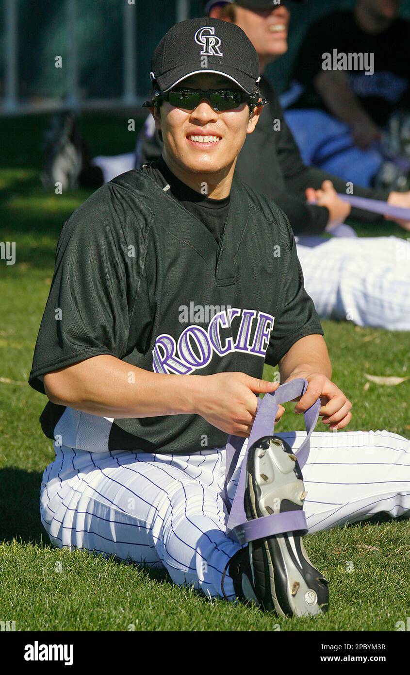 Colorado Rockies pitcher Byung-Hyun Kim gets ready to do some leg ...