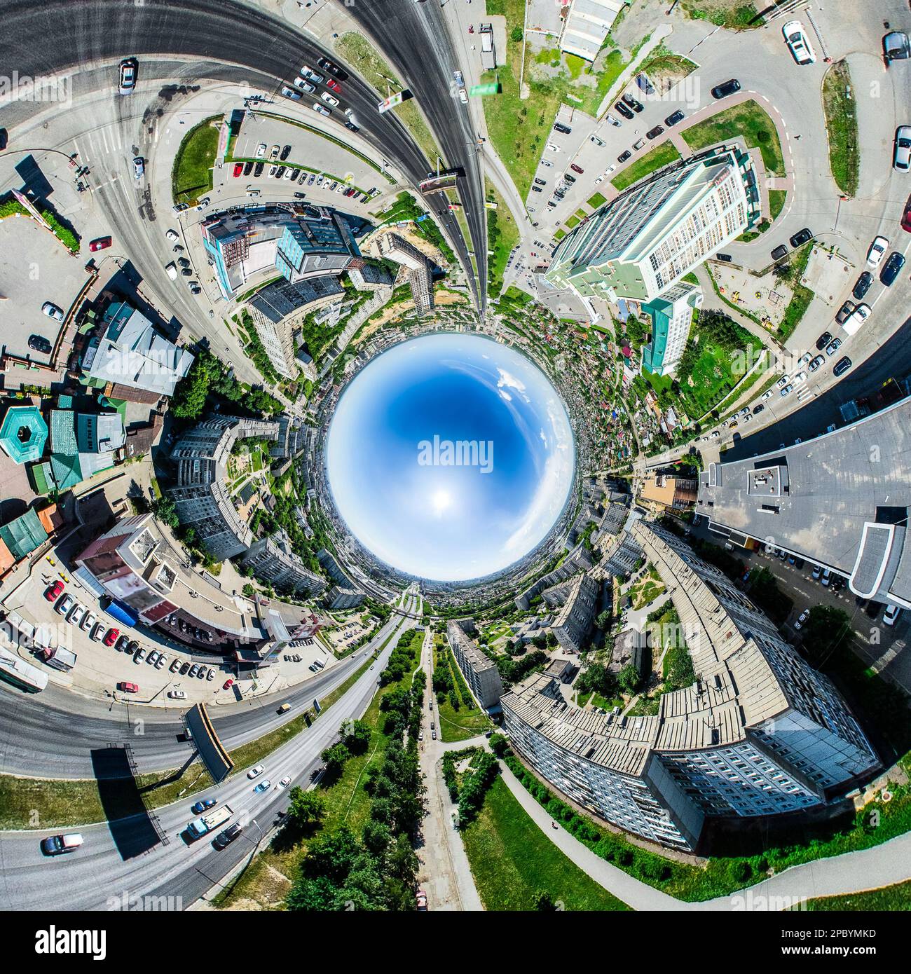 Aerial city view with crossroads and roads, houses, buildings, parks ...