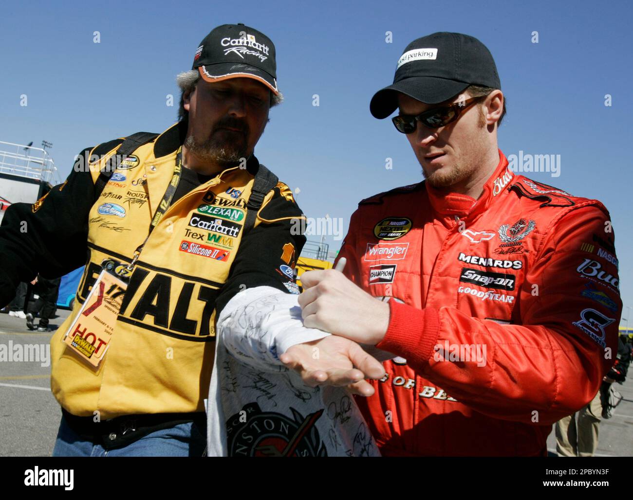 Dale Earnhardt Jr Signs An Autograph For A Fan At Daytona