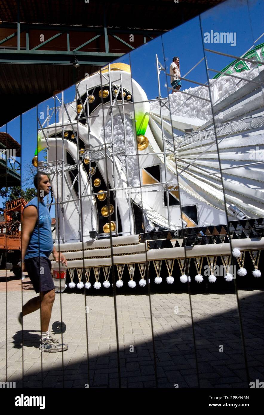 A Mocidade samba school float is reflected on mirrors as the float is ...