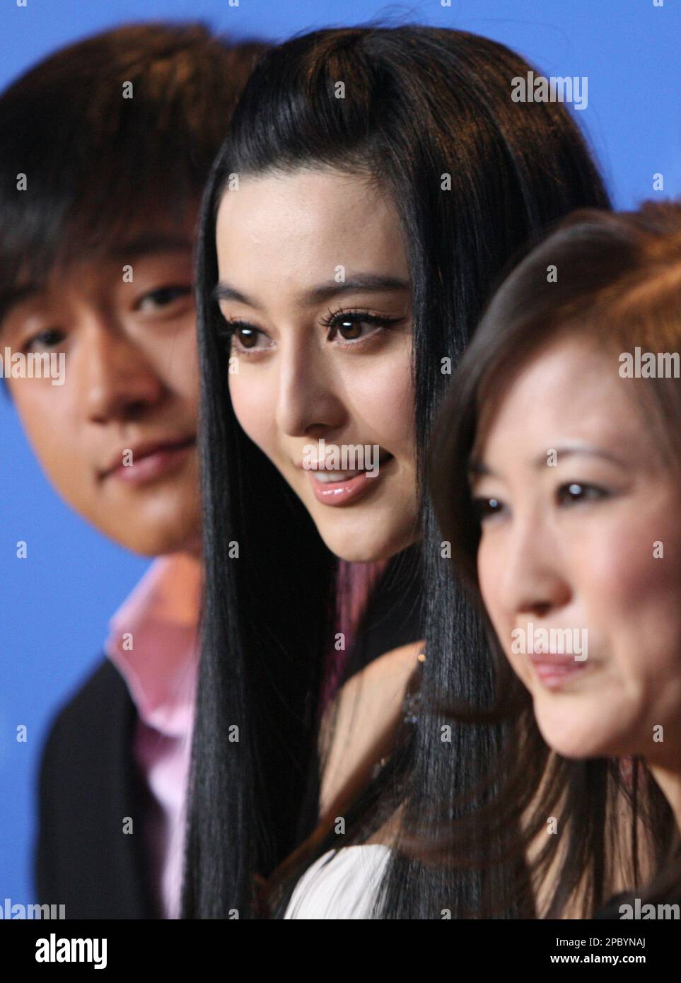 Chinese actress Fan Bing Bing, center, poses with Chinese actor Tong Da ...