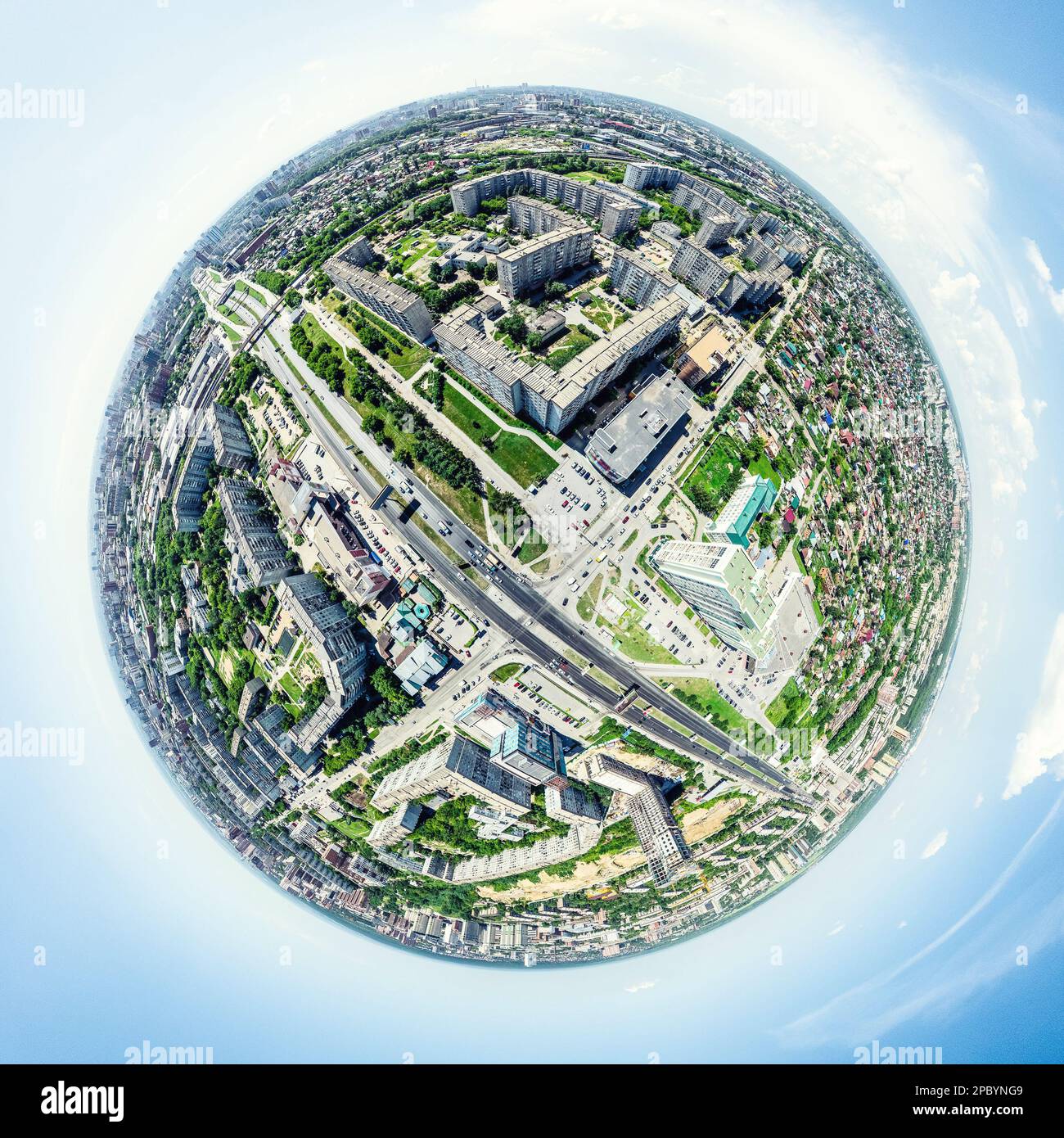 Aerial city view with crossroads and roads, houses, buildings, parks ...