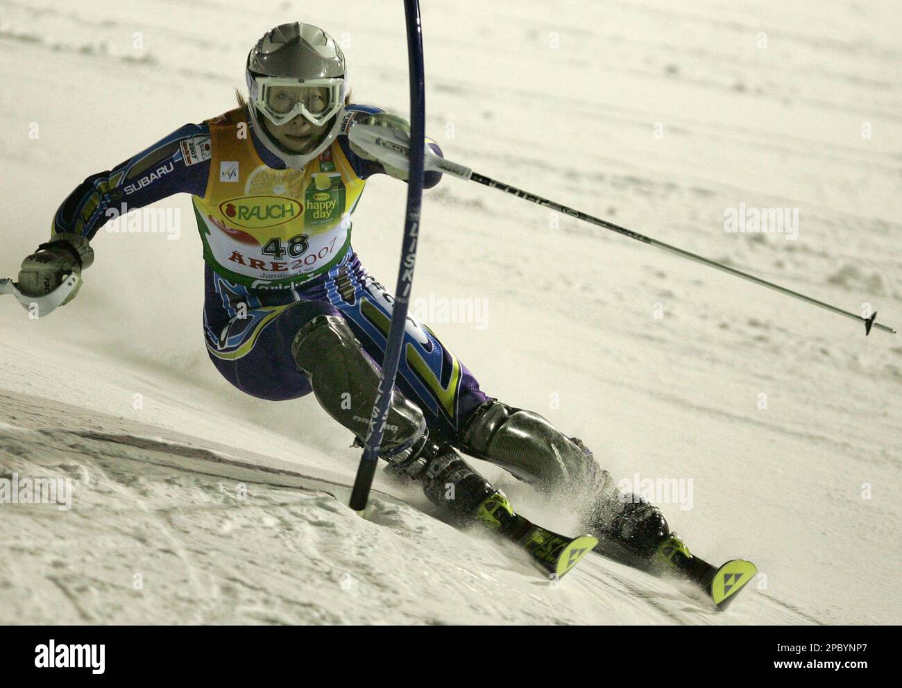 Japan's Hiromi Yumoto negotiates a pole during the first run of the ...