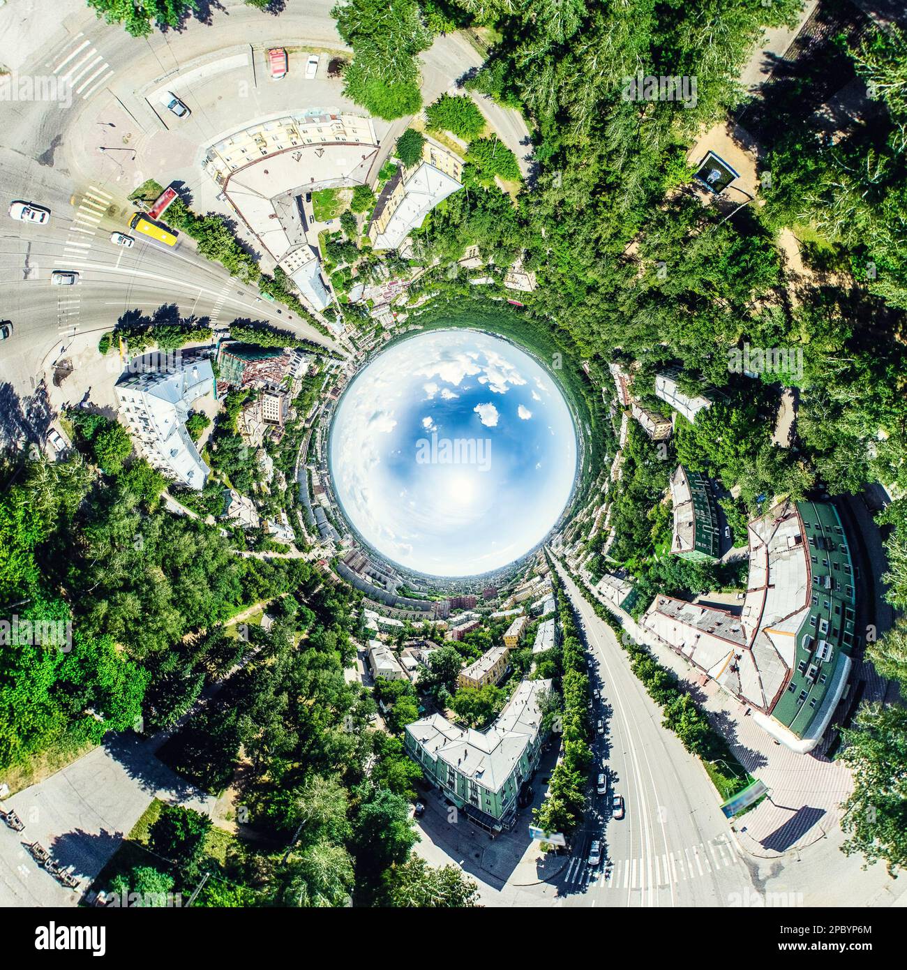 Aerial city view with crossroads and roads, houses, buildings, parks ...