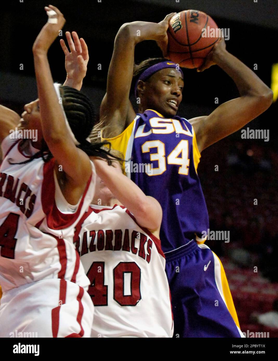 Louisiana State's Sylvia Fowles (34) grabs a defensive rebound over ...
