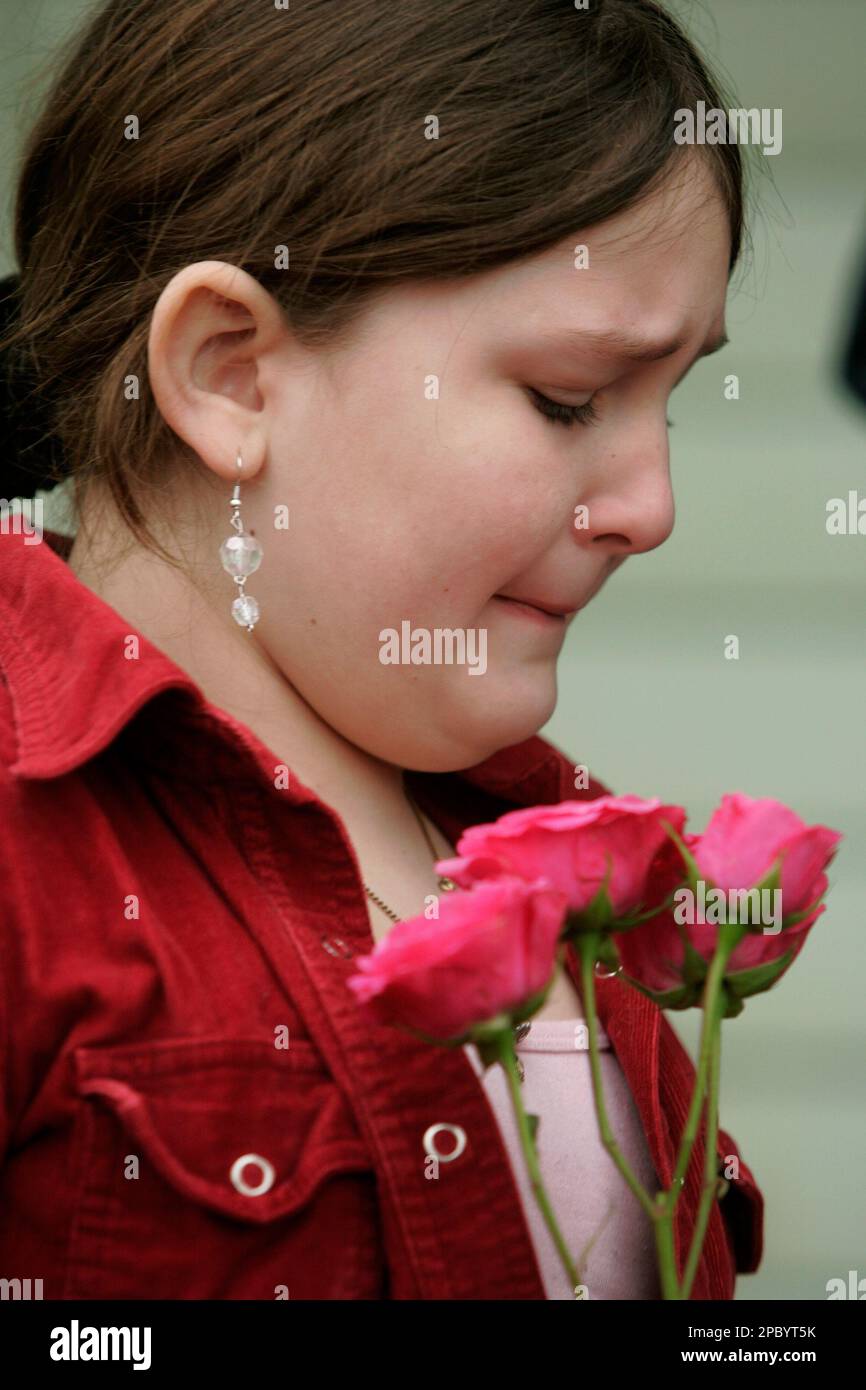 Fatima Talovic, 11, sister of 18-year-old Sulejman, cries as she talks ...