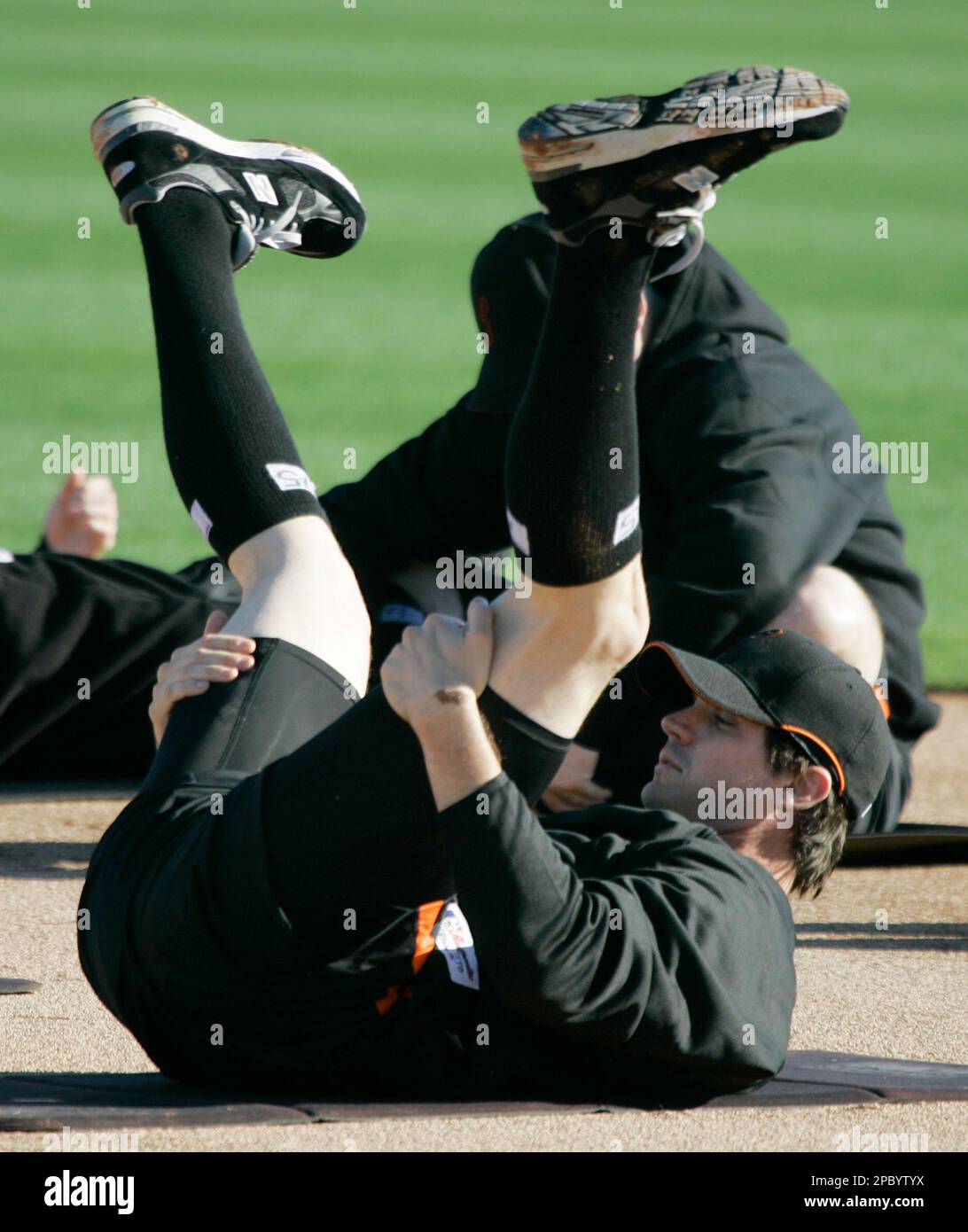 San Francisco Giants' new pitcher Barry Zito stretches his legs during ...