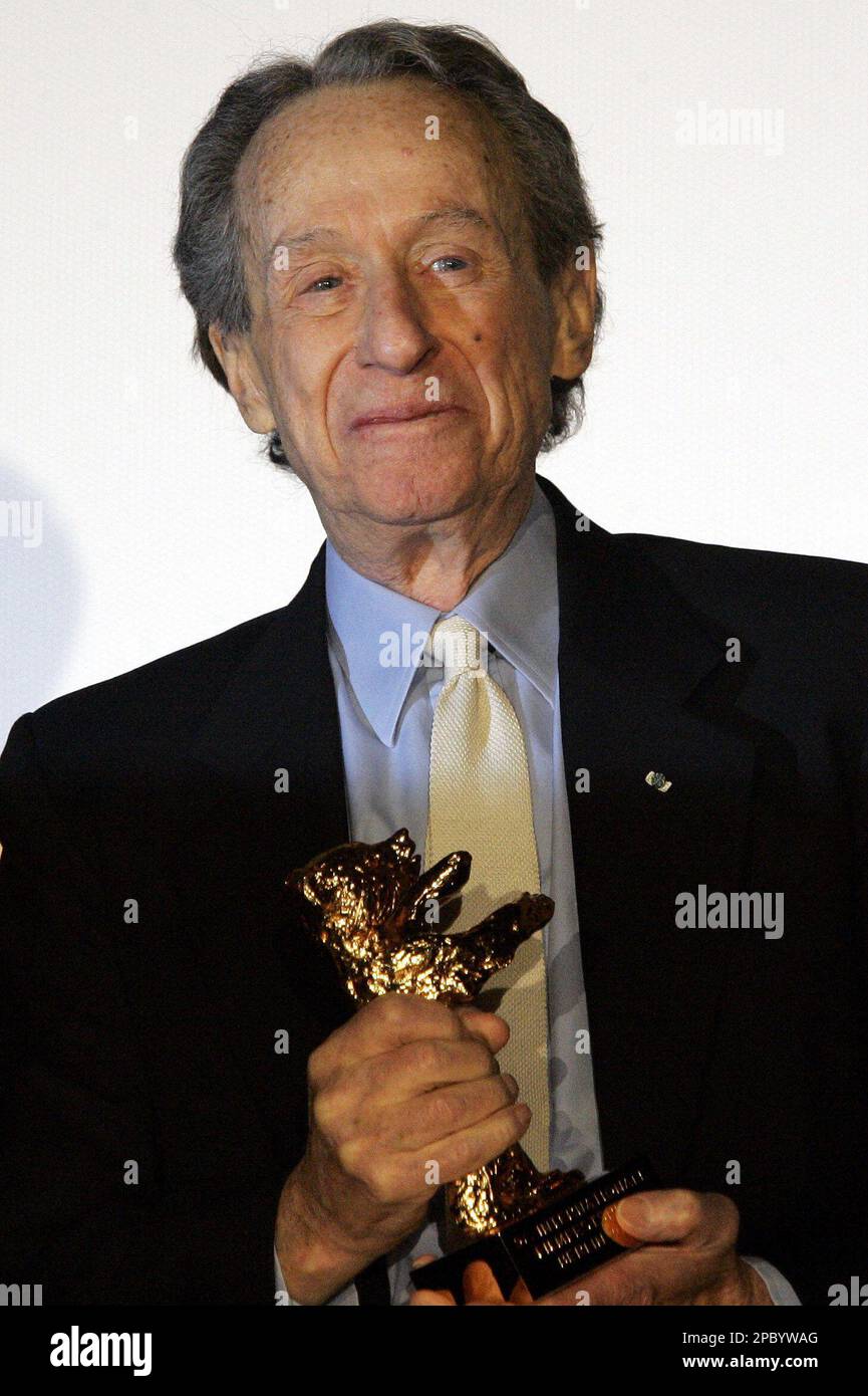 U.S. director Arhur Penn holds the Golden Berlinale Bear awarded for ...