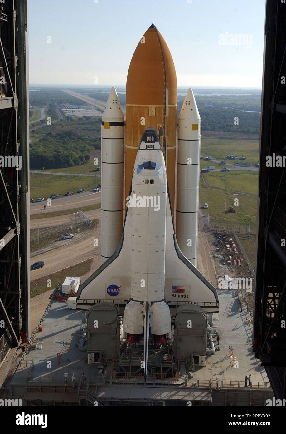 The space shuttle Atlantis is moved from the Vehicle Assembly building ...