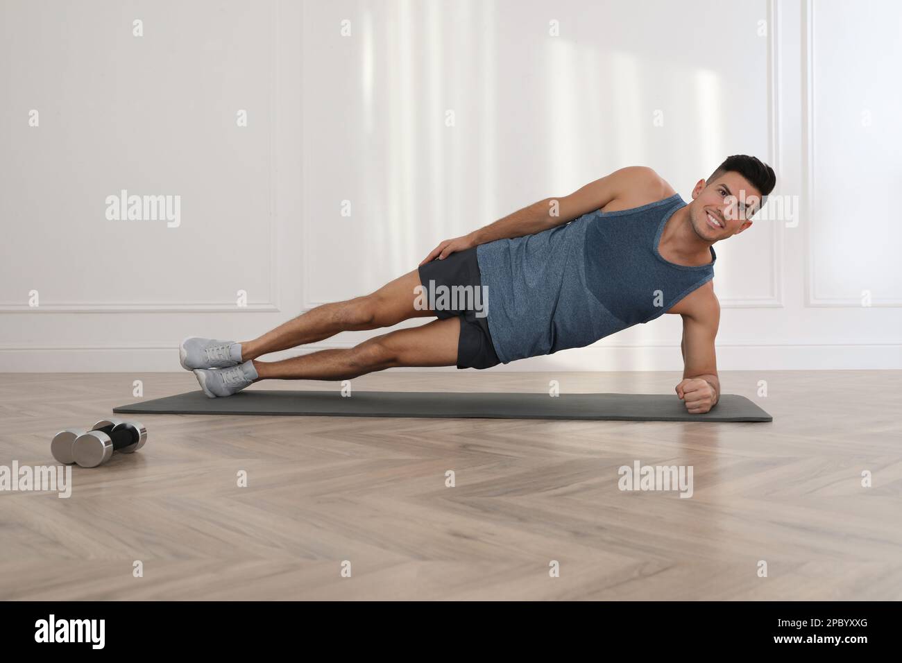 Side plank man exercise hi-res stock photography and images - Alamy