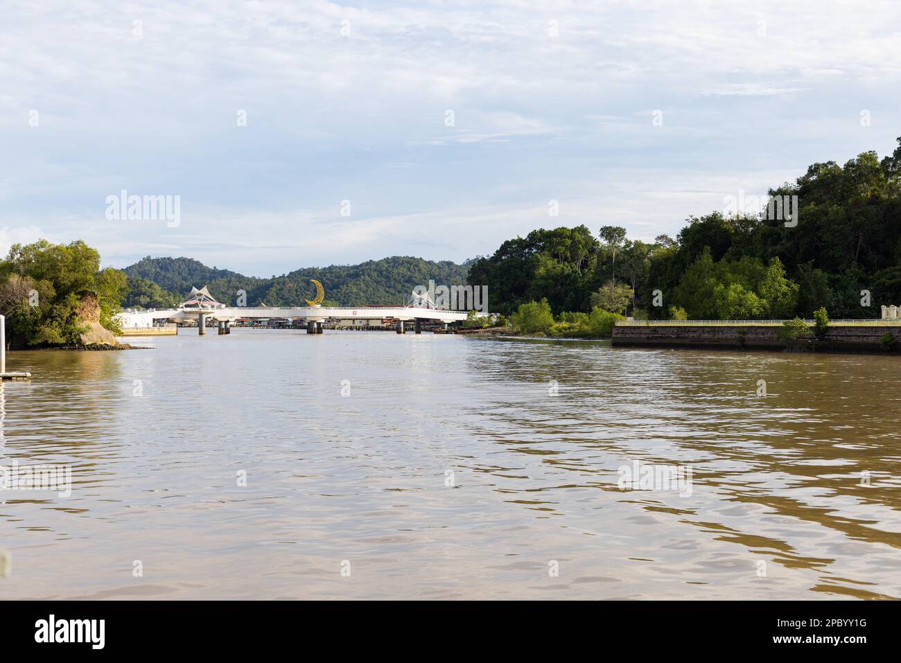8 3 2023 trees, boat and building along Sungai Kedayan river, the ...