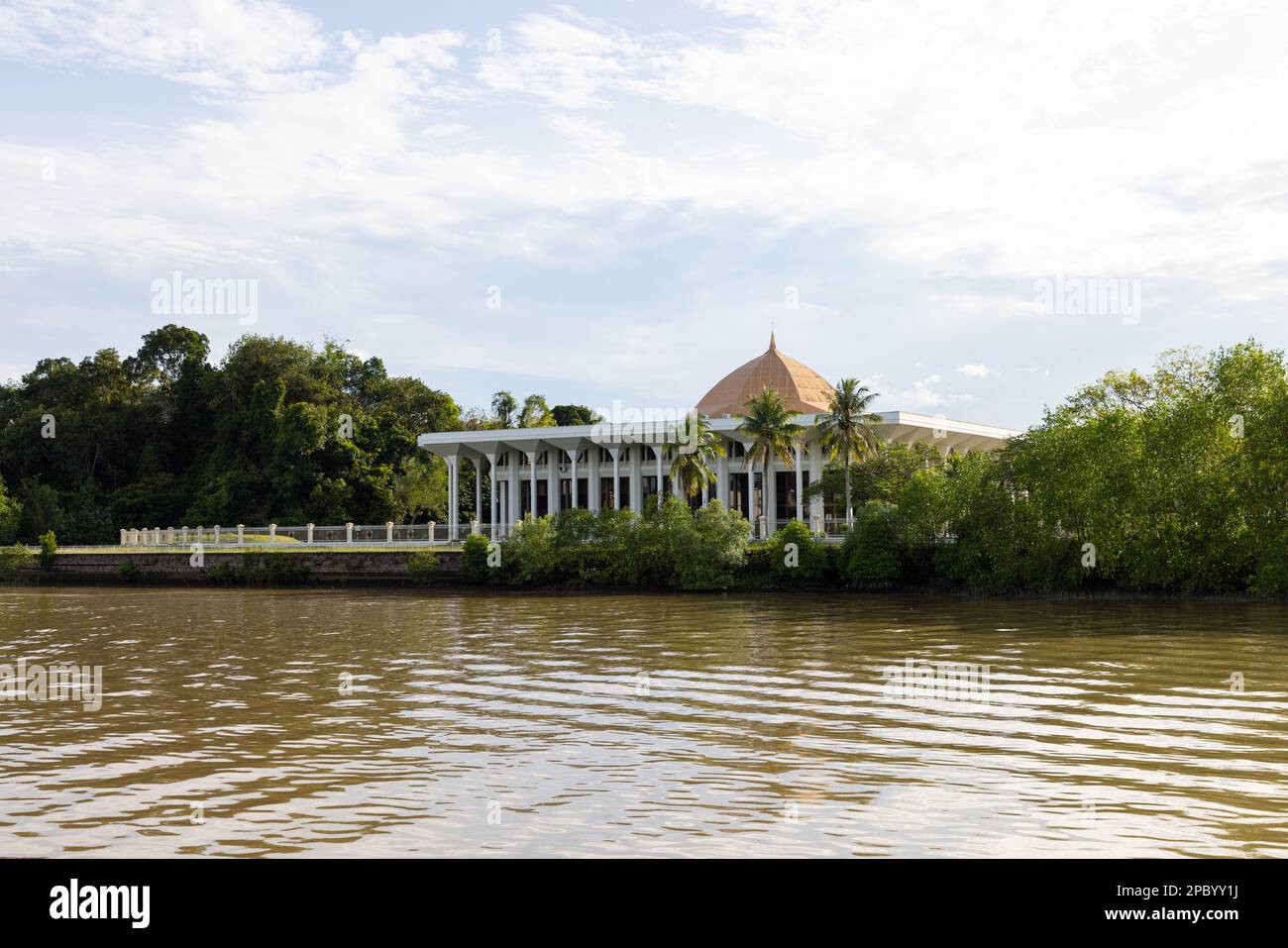 8 3 2023 trees, boat and building along Sungai Kedayan river, the ...