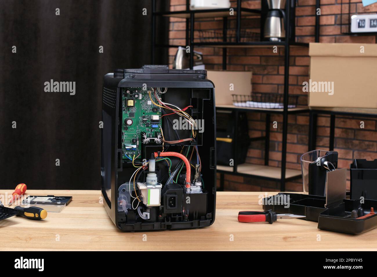 Coffee machine repair hi-res stock photography and images - Alamy