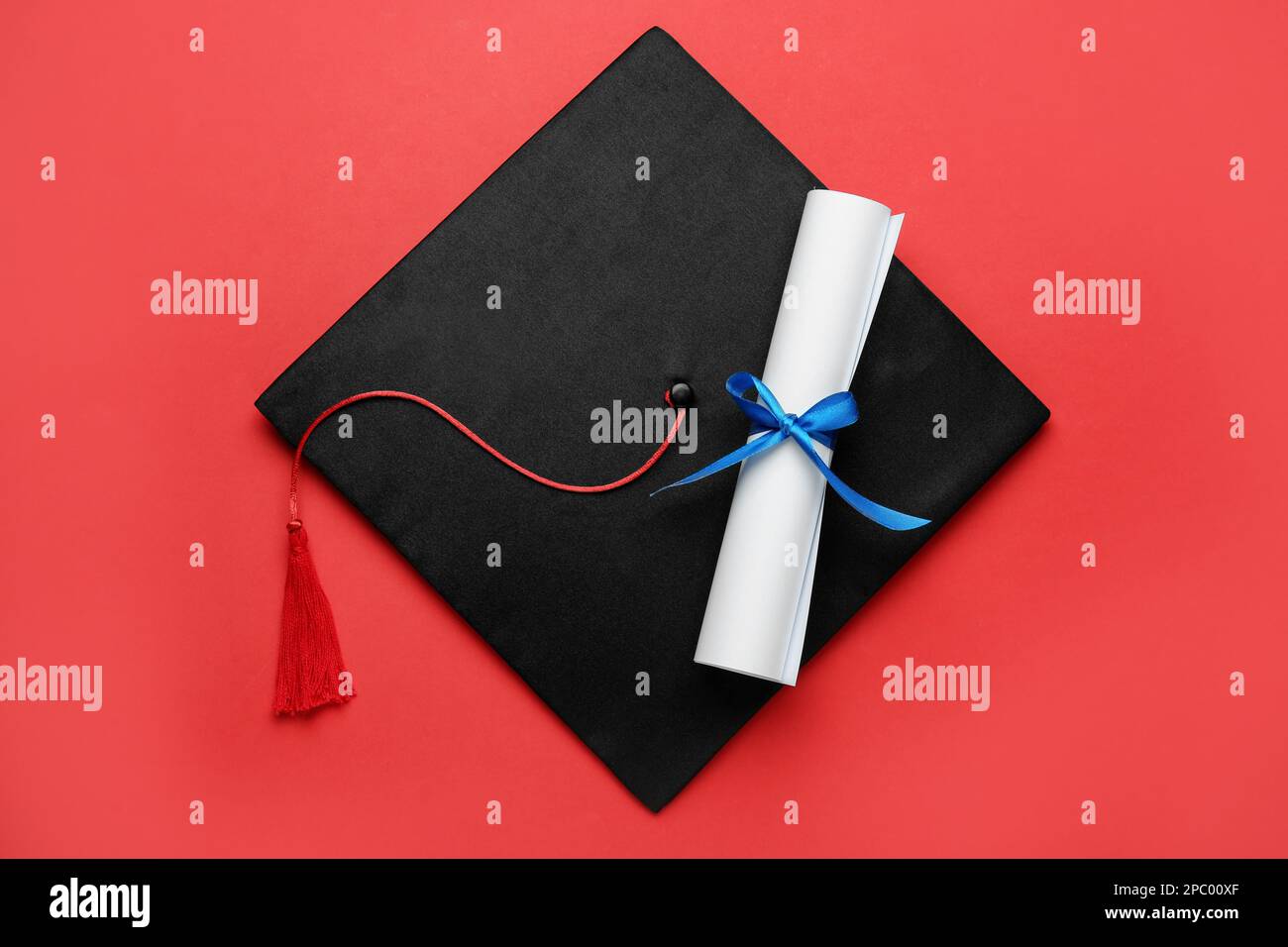 Graduation cap tassel red ribbon hi-res stock photography and images ...