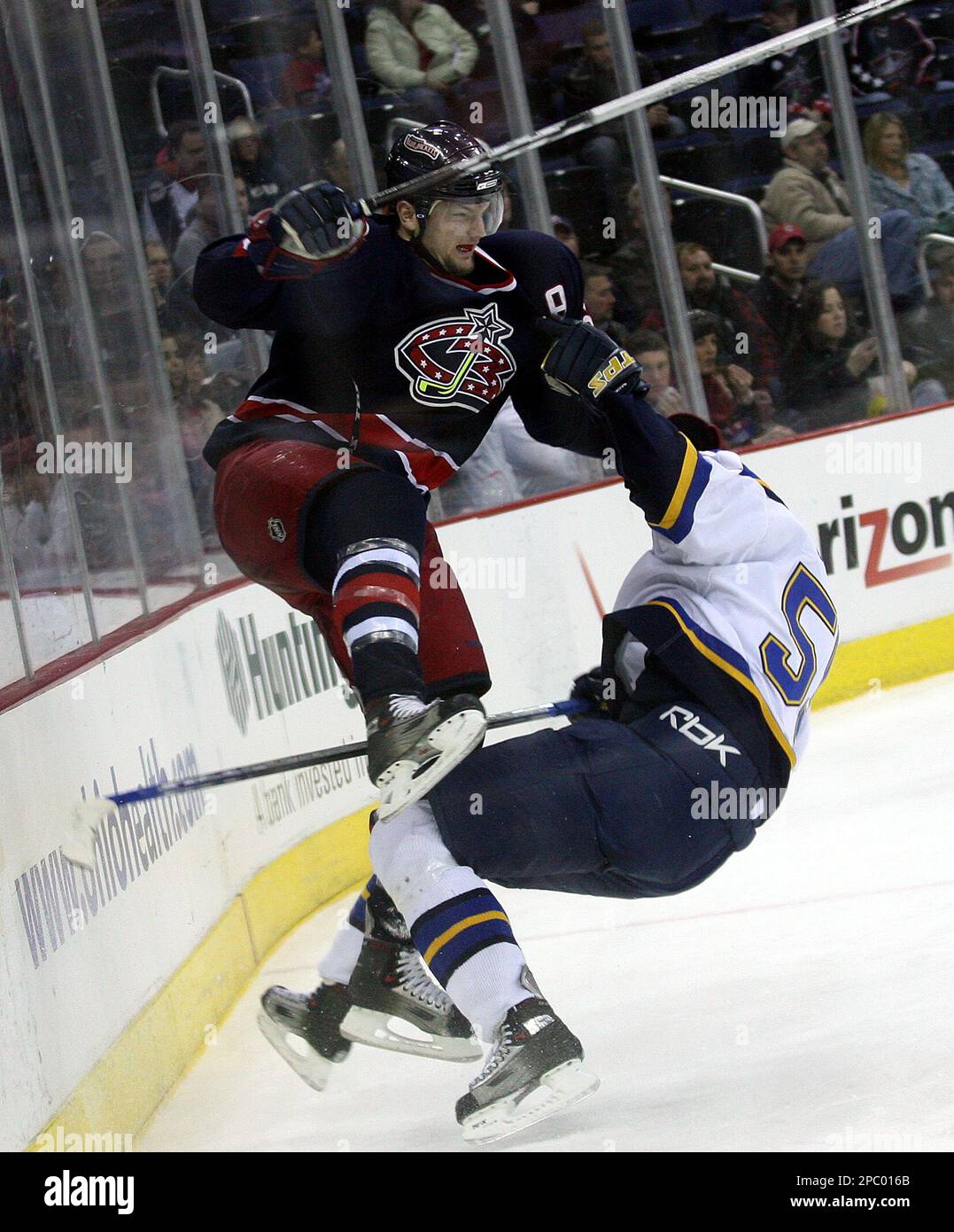 Columbus Blue Jackets' Rick Nash, left, knocks St. Louis Blues ...