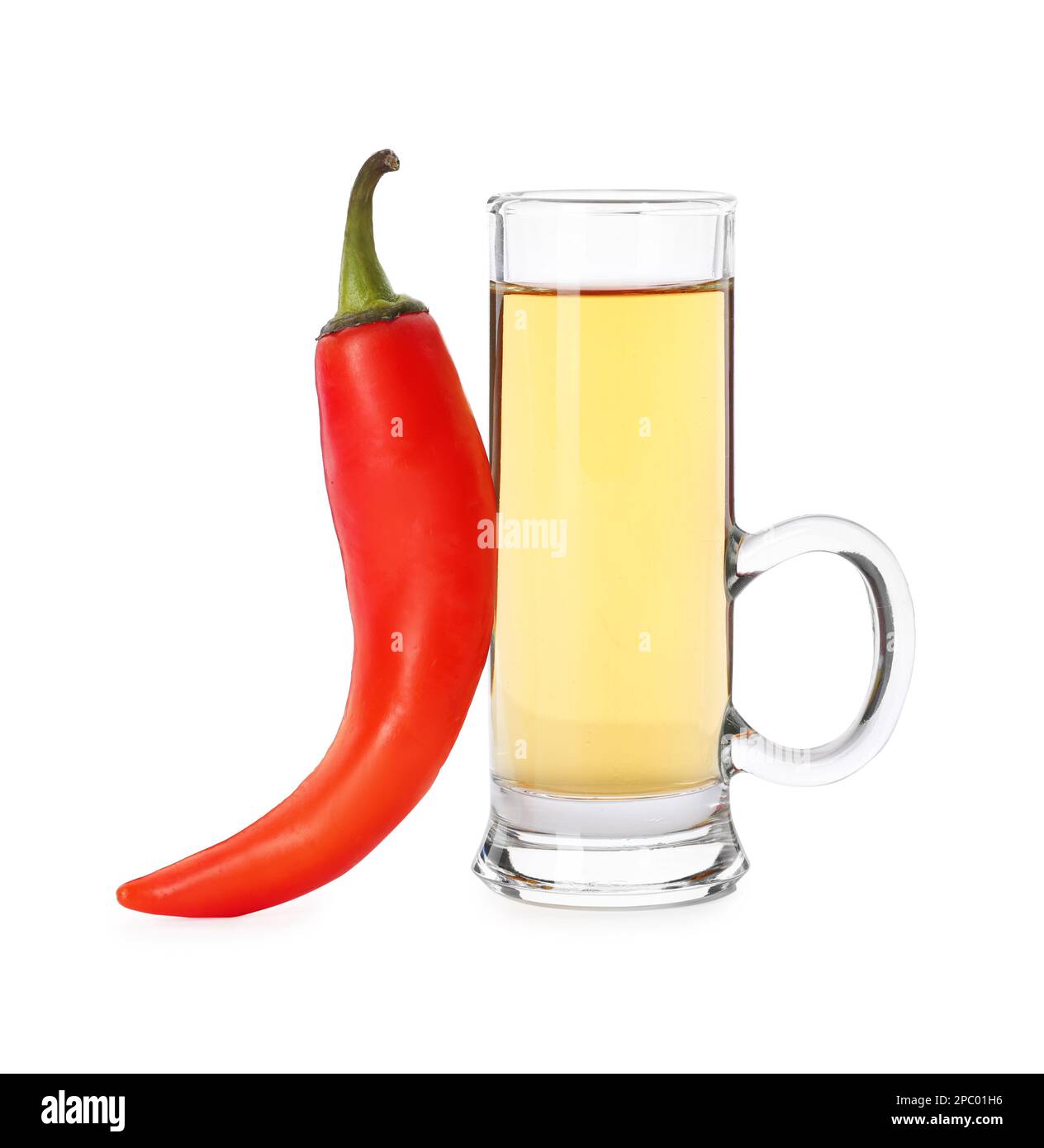 Red hot chili pepper and vodka in shot glass on white background Stock ...