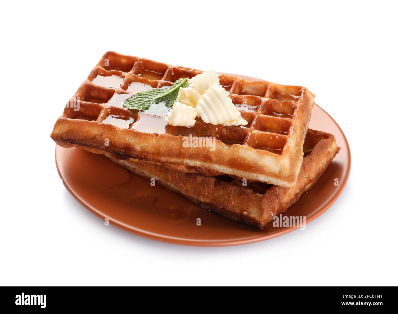 Delicious Belgian waffles with honey, mint and butter on white ...