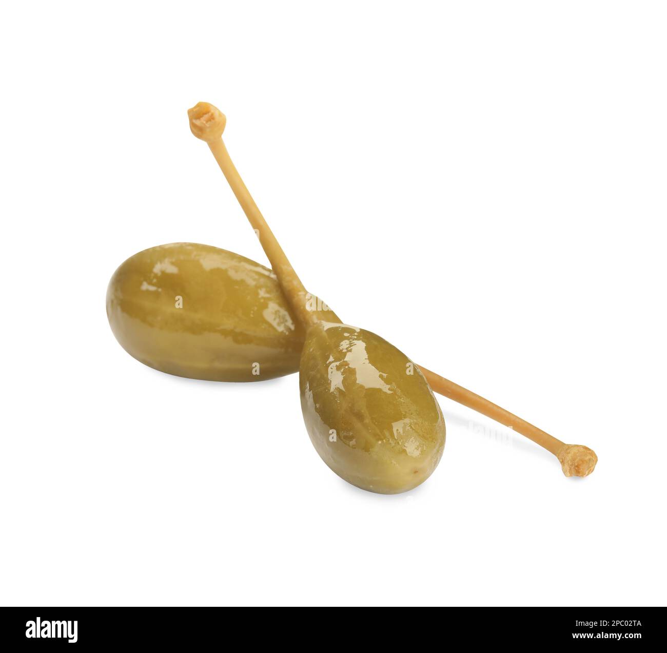 Two delicious pickled capers on white background Stock Photo - Alamy