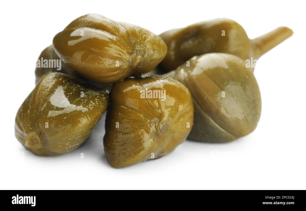Pile of delicious pickled capers on white background Stock Photo - Alamy
