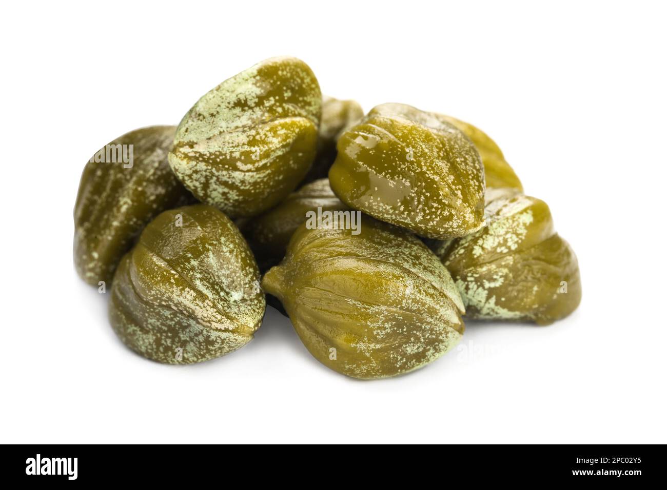 Pile of delicious pickled capers on white background Stock Photo - Alamy
