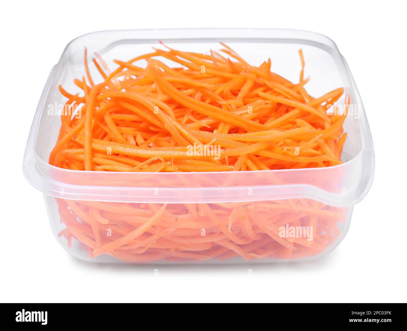 Fresh shredded carrots in plastic container isolated on white Stock ...