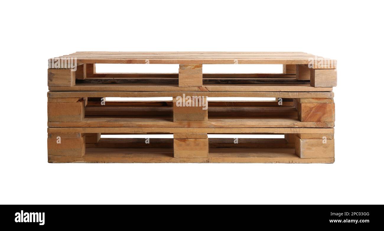 Stacked wooden pallets isolated on white. Transportation and storage ...