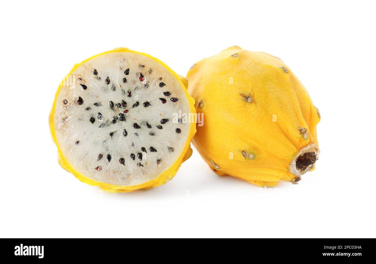 Delicious cut and whole yellow pitahaya fruits on white background ...