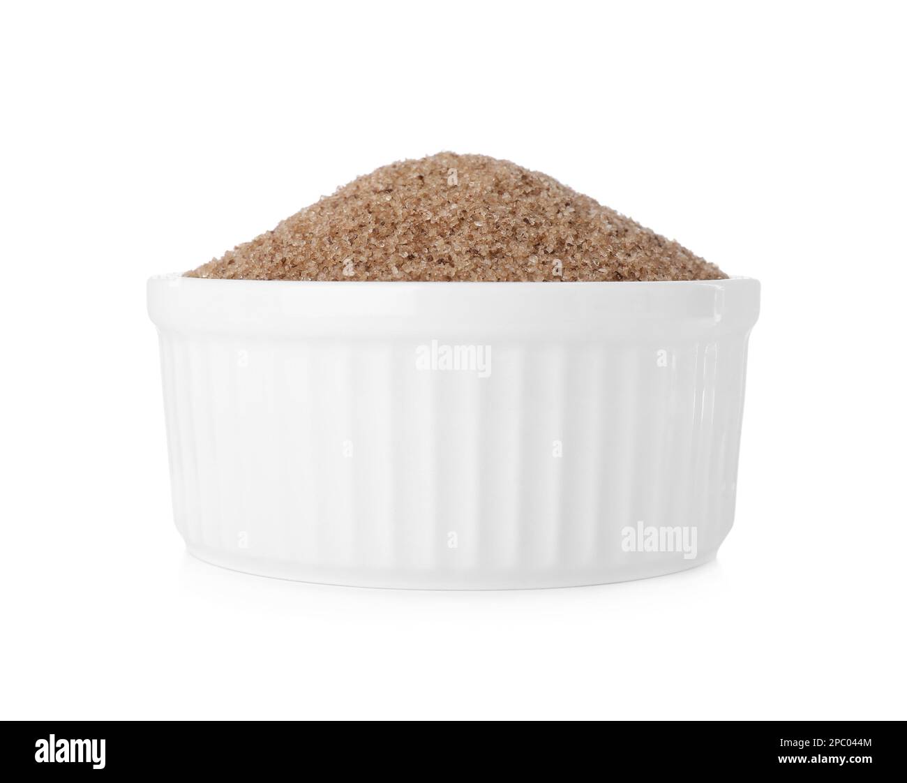 Brown salt in bowl isolated on white Stock Photo - Alamy
