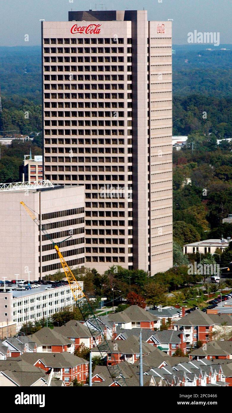 ** FILE ** The Coca Cola headquarters building towers above the midtown ...