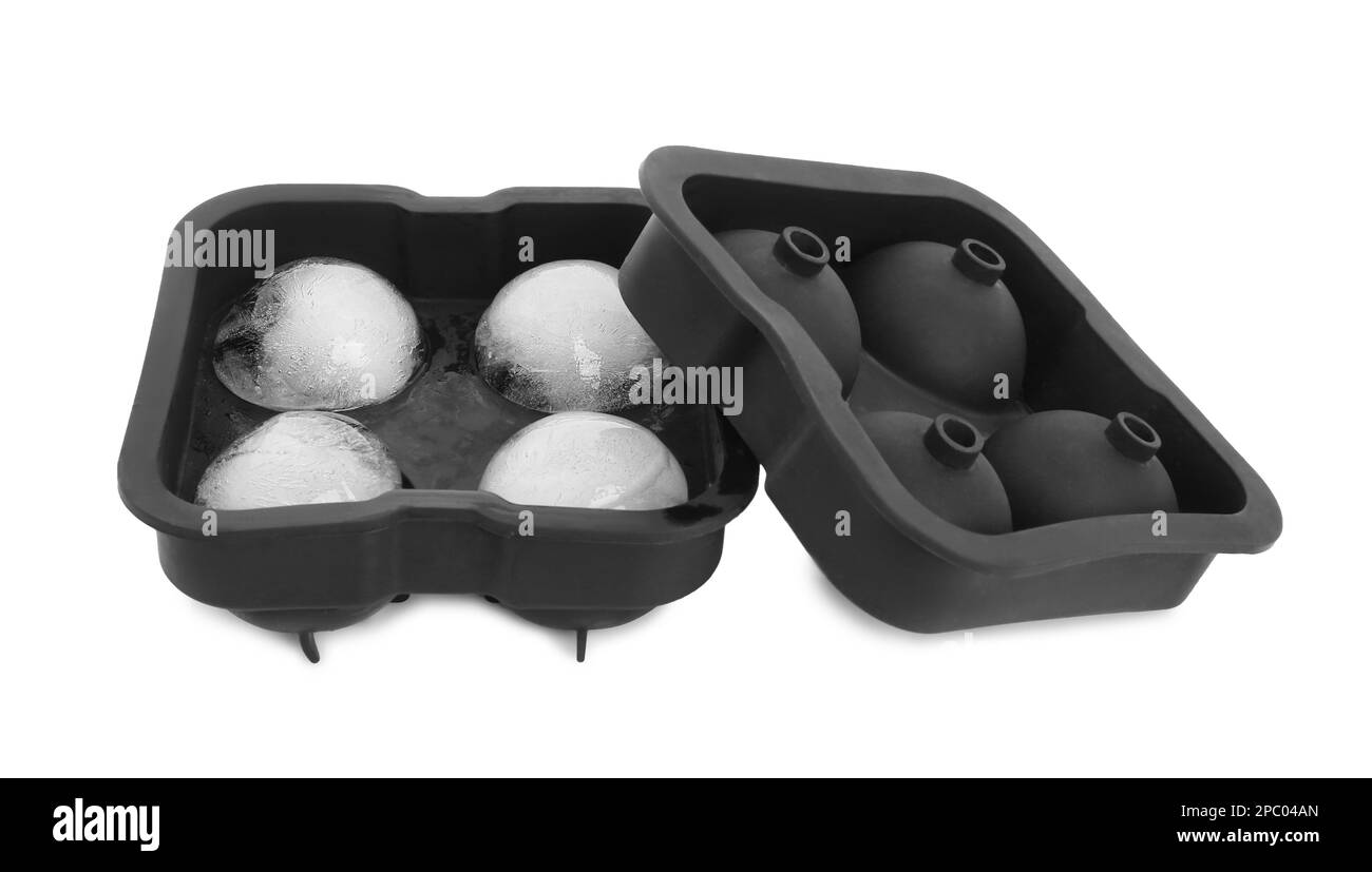 Frozen ice balls in mold on white background Stock Photo - Alamy