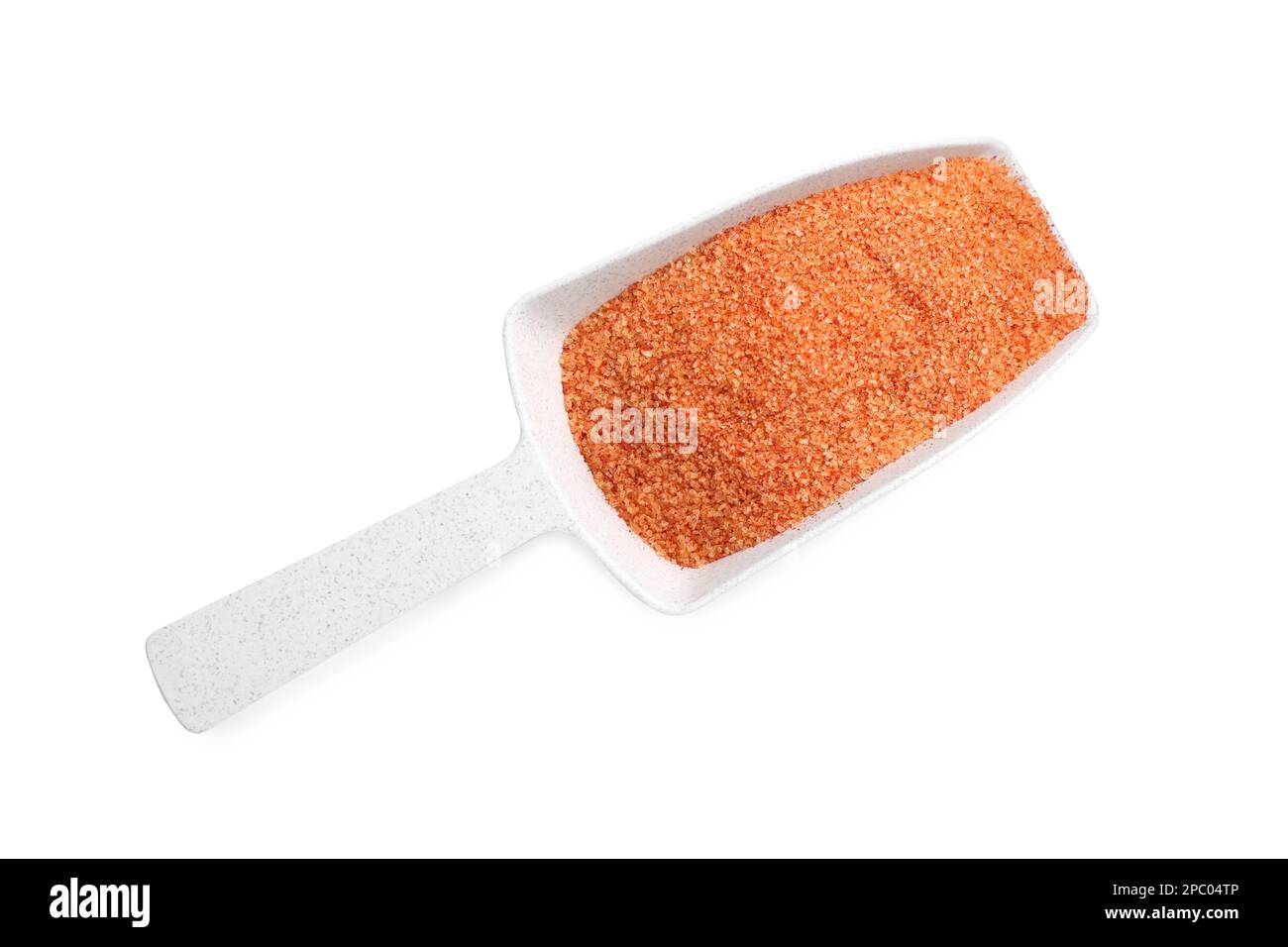 Orange salt in scoop isolated on white, top view Stock Photo - Alamy
