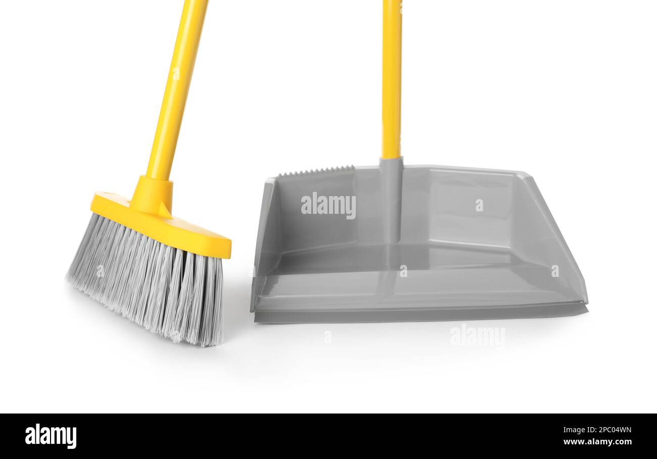 Plastic broom and dustpan on white background Stock Photo - Alamy