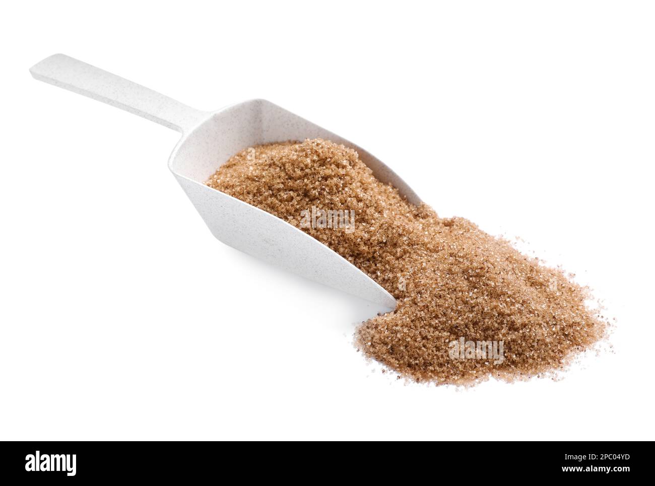 Brown salt and scoop on white background Stock Photo - Alamy