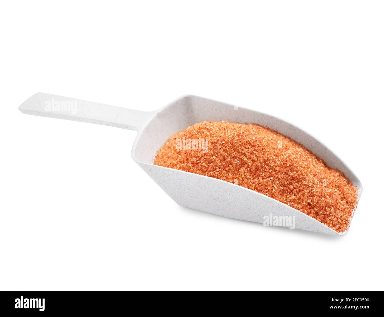Orange salt in scoop isolated on white Stock Photo - Alamy