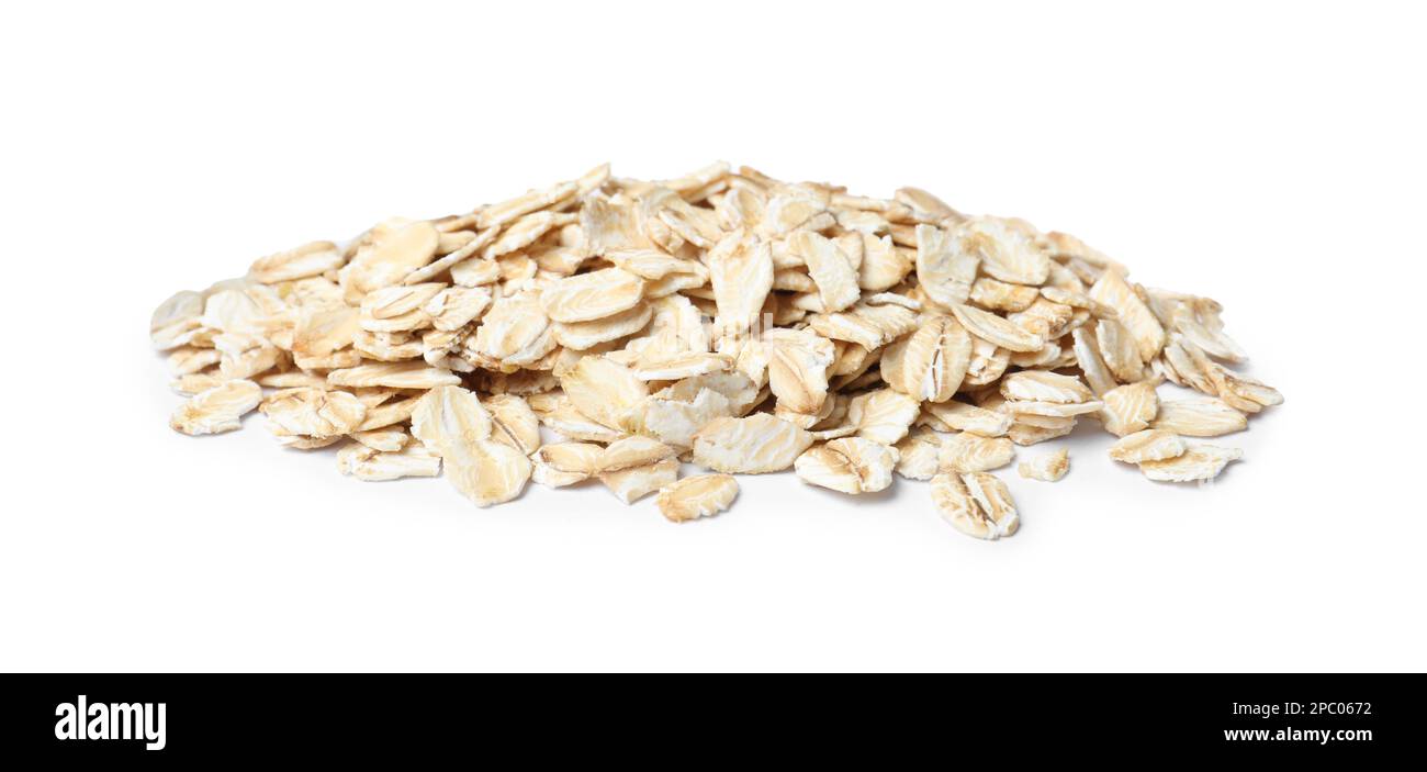 Pile of raw oatmeal on white background Stock Photo - Alamy