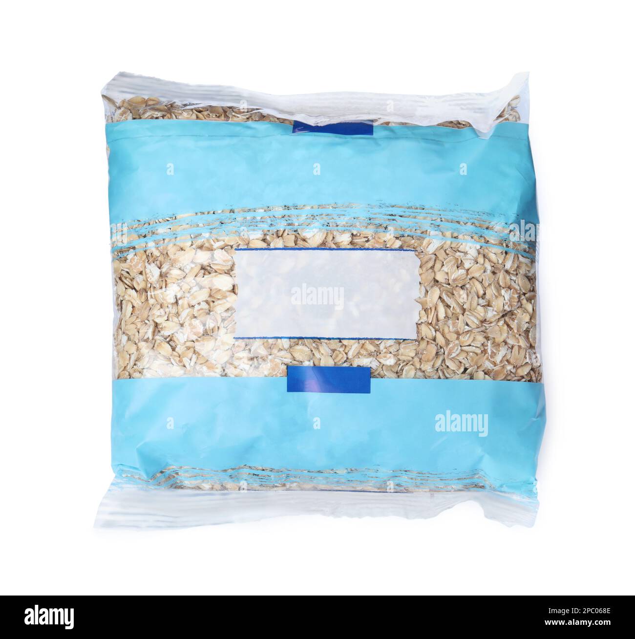 Raw oatmeal in package isolated on white Stock Photo - Alamy