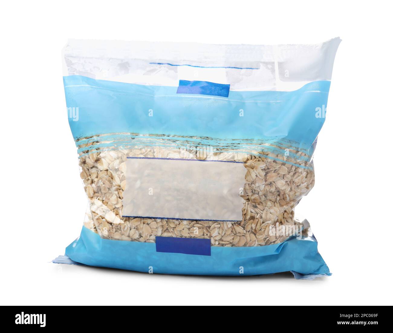Raw oatmeal in package isolated on white Stock Photo - Alamy